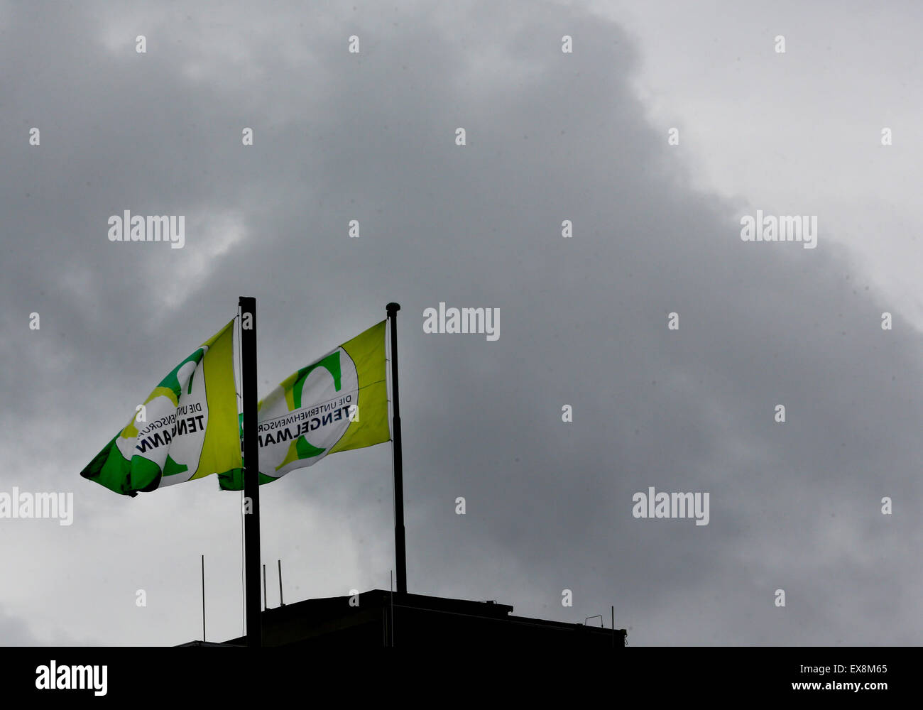 Flags of the Tengelmann Group fly on top of the corporate headquarters ...