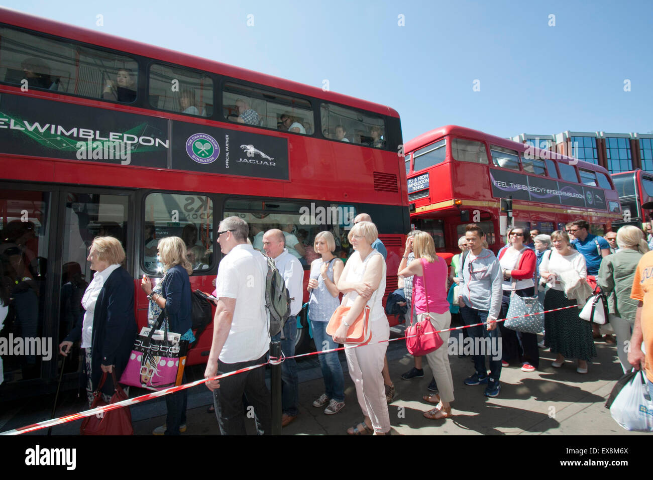 Wimbledon, London, UK. 09th July, 2015. Crowds queue to board buses for ...