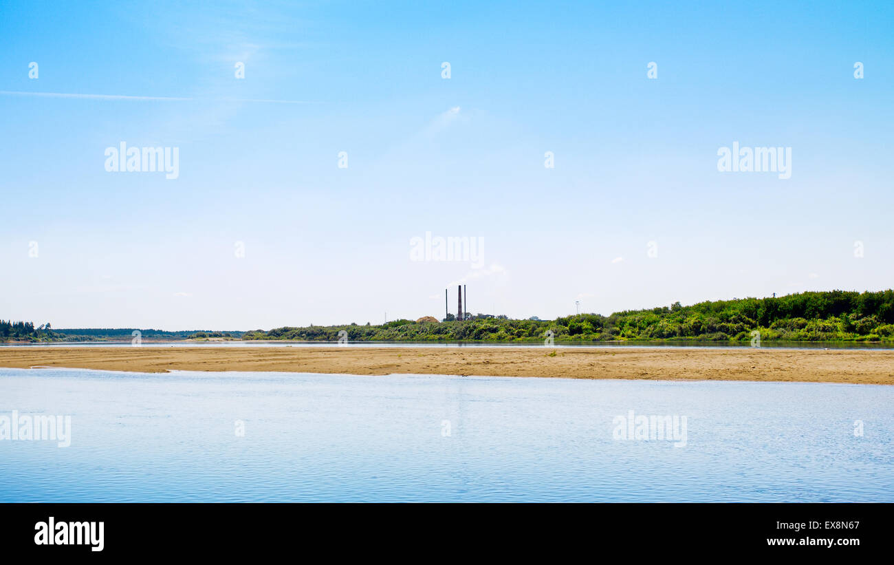 calm river under blue sky at summer day Stock Photo - Alamy
