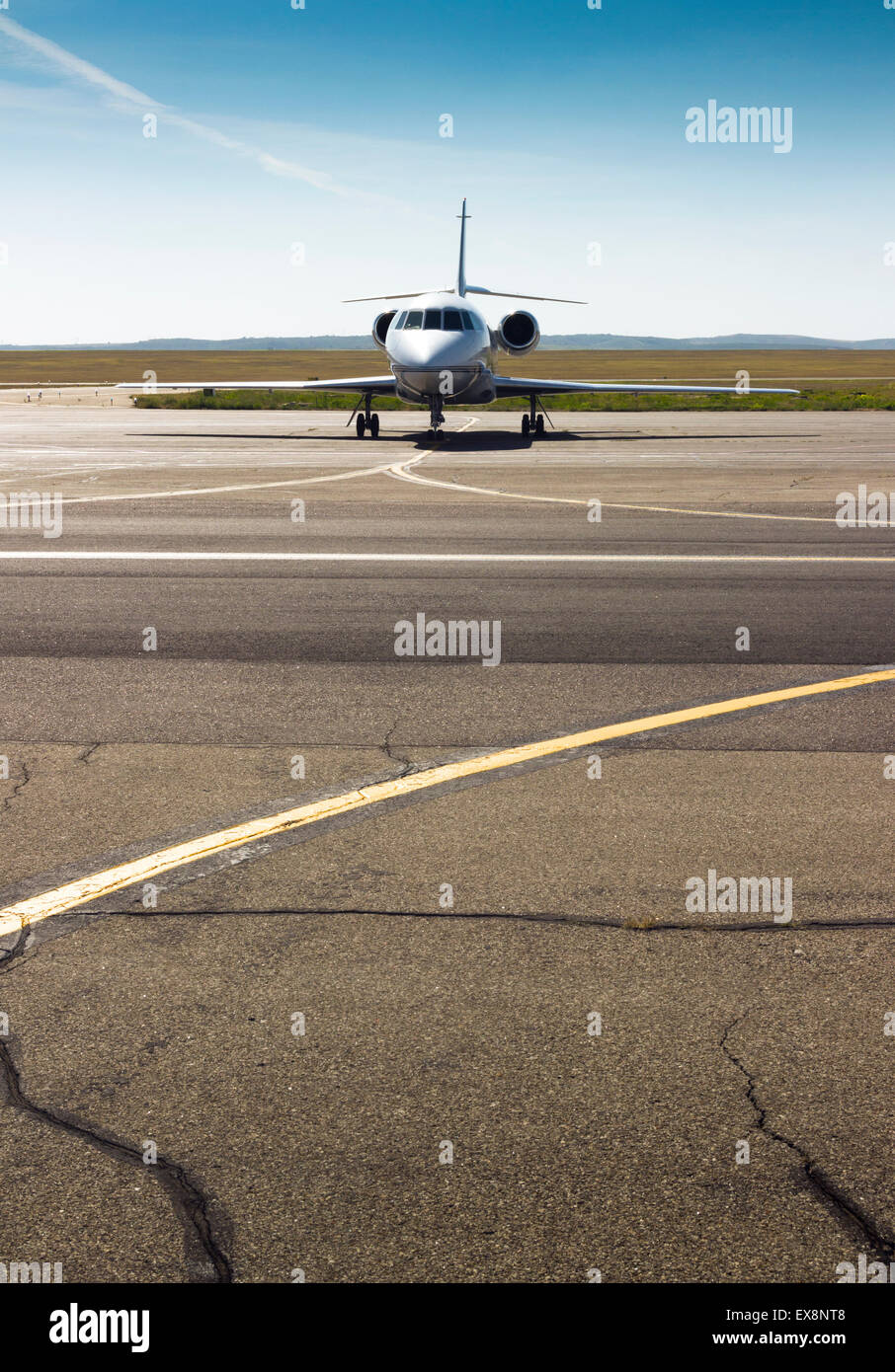 parked private jet on the runway. white civic, modern airplane Stock ...