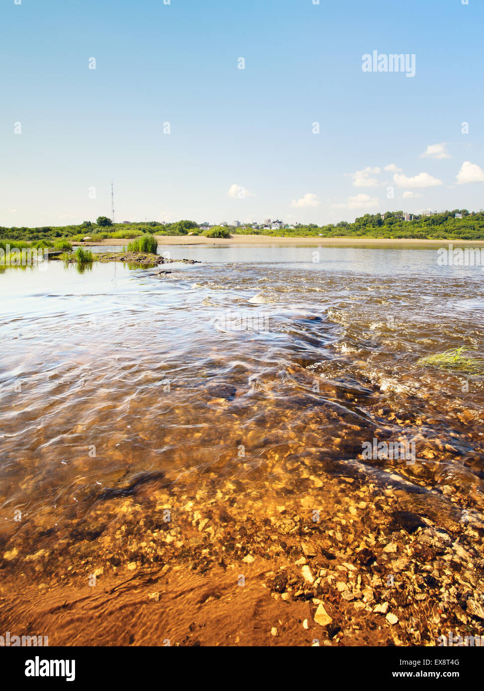 calm river under blue sky at summer day Stock Photo - Alamy
