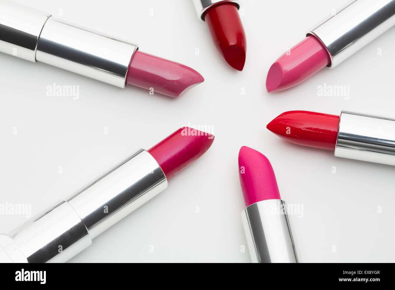 Various lipsticks on white background Stock Photo - Alamy