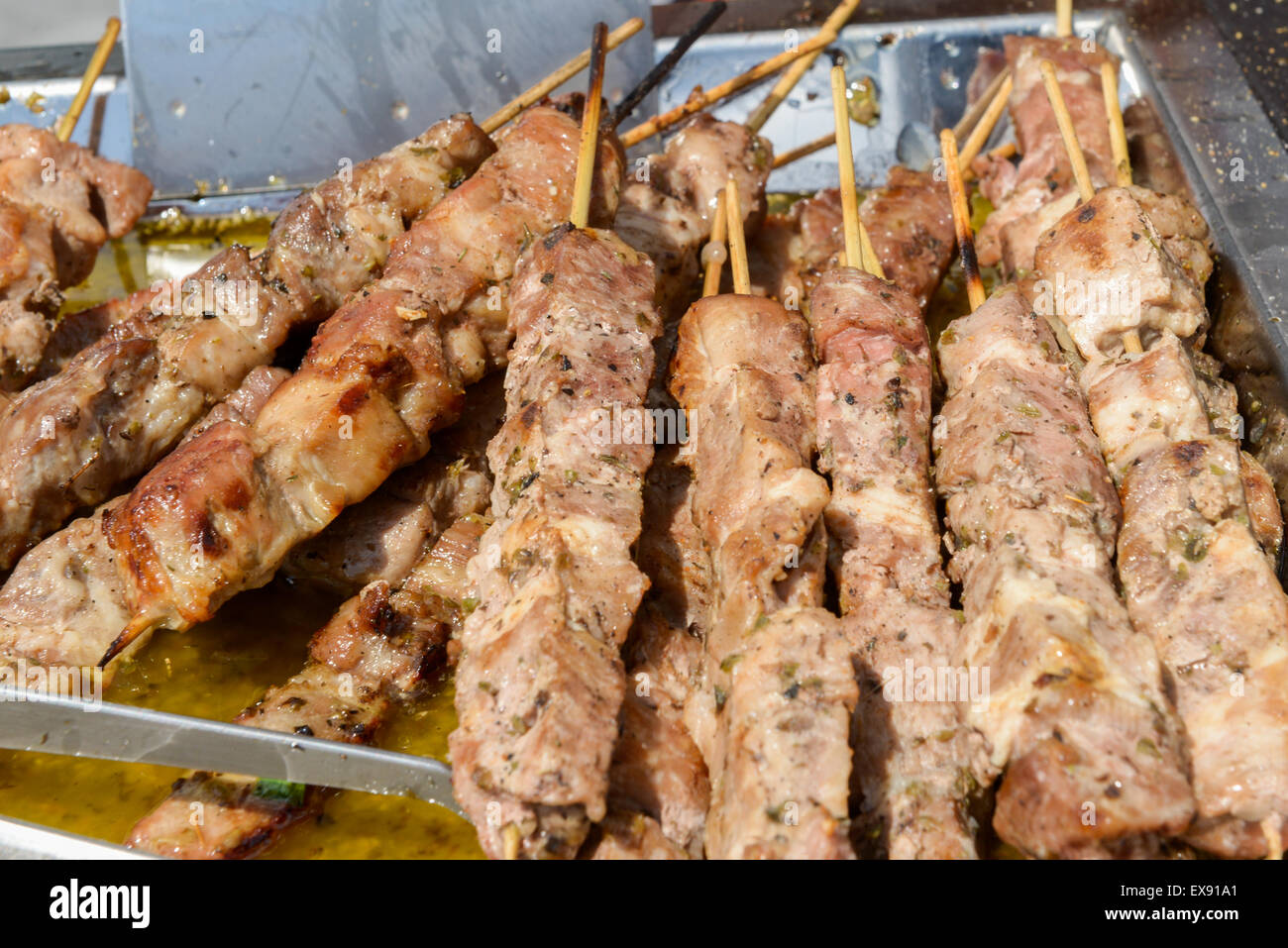 Juicy roasted kebabs on the grill in smoke Stock Photo - Alamy