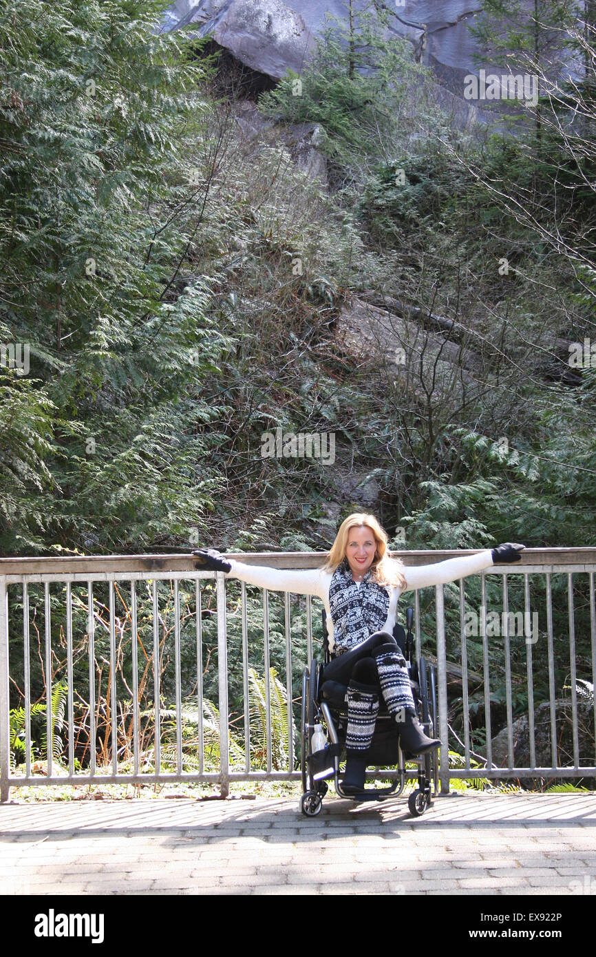 Woman in a wheelchair at Shannon Falls Stock Photo - Alamy