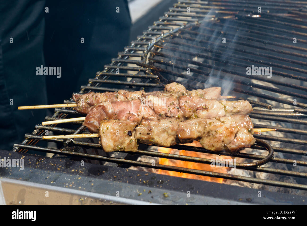 Juicy roasted kebabs on the grill in smoke Stock Photo - Alamy