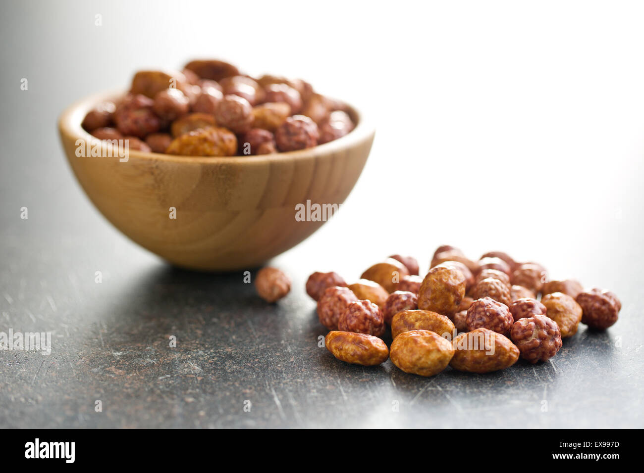 various sugared nuts in bowl Stock Photo - Alamy