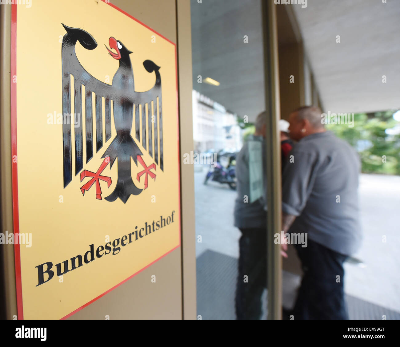A man walks through the main entrance of the German Federal Court of ...