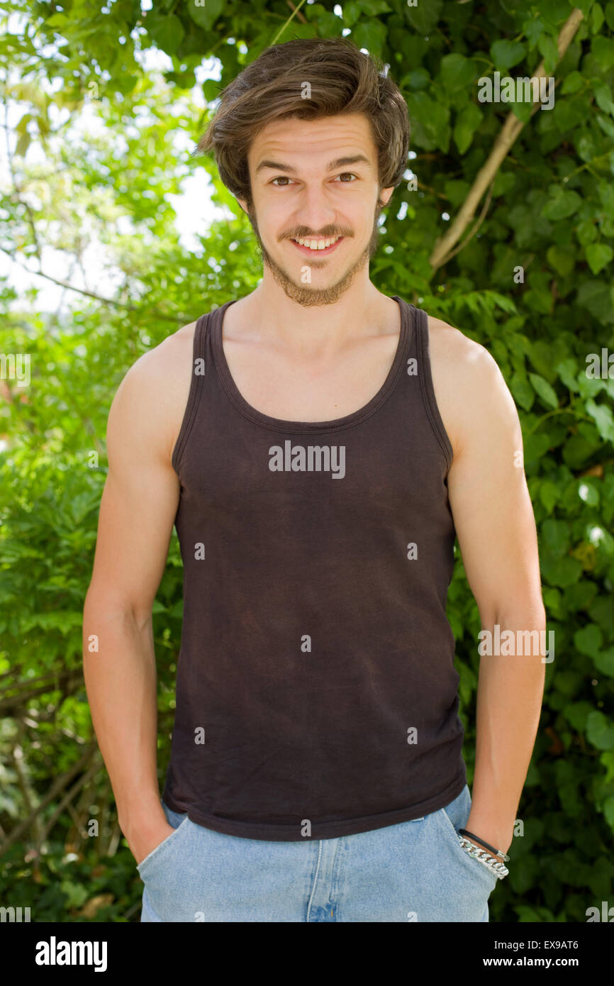 young casual happy man posing, outdoors Stock Photo - Alamy
