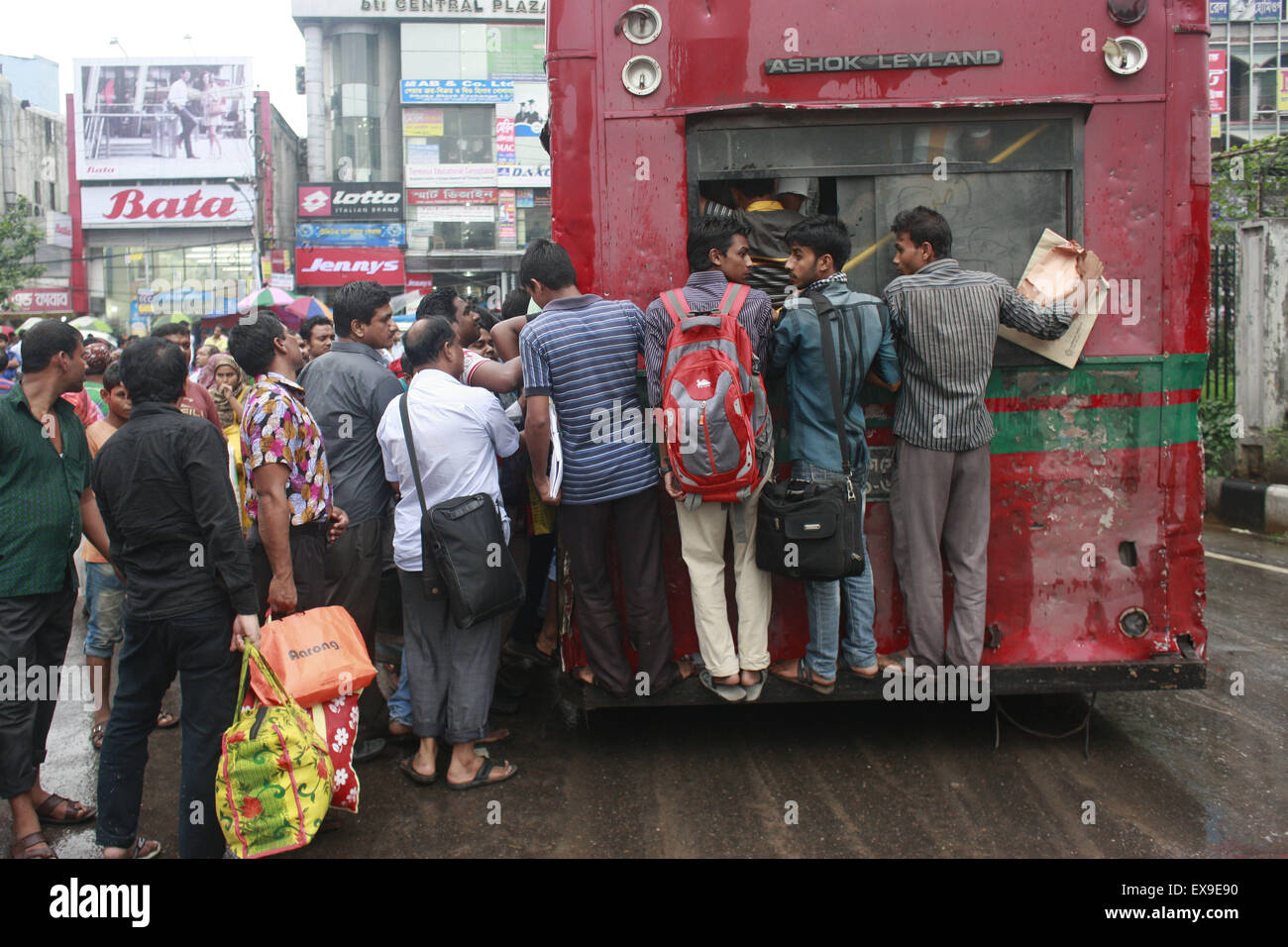 Dhaka, Bangladesh. 9th July, 2015. People jump onto whatever space ...