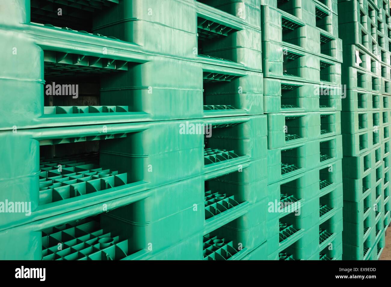 Green plastic pallets in warehouses, sorted and delivered Stock Photo ...