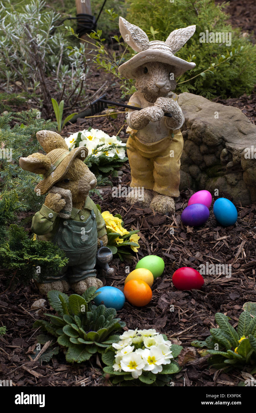 Easter eggs and bunnies in garden Stock Photo - Alamy