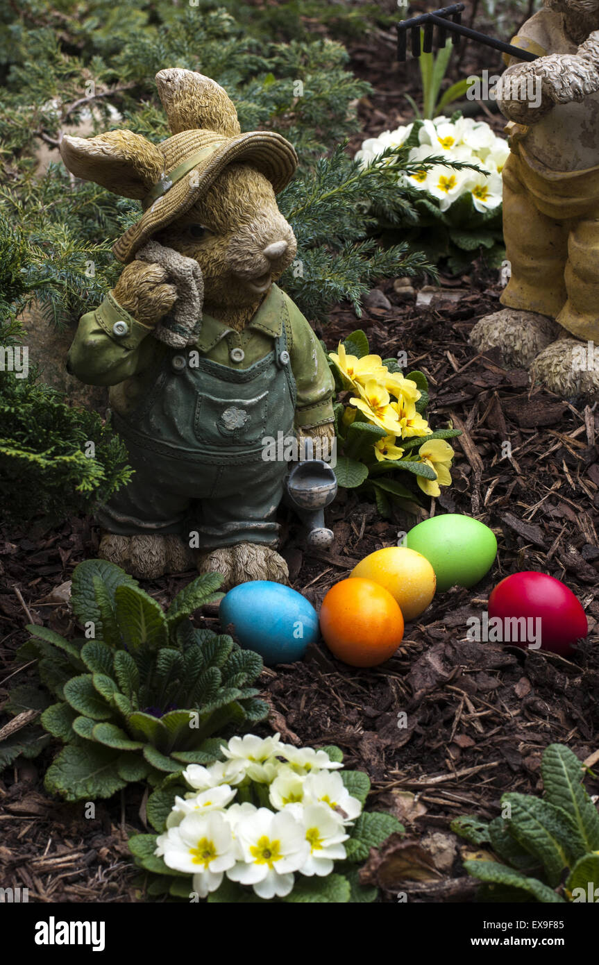 Easter eggs and bunnies in garden Stock Photo - Alamy