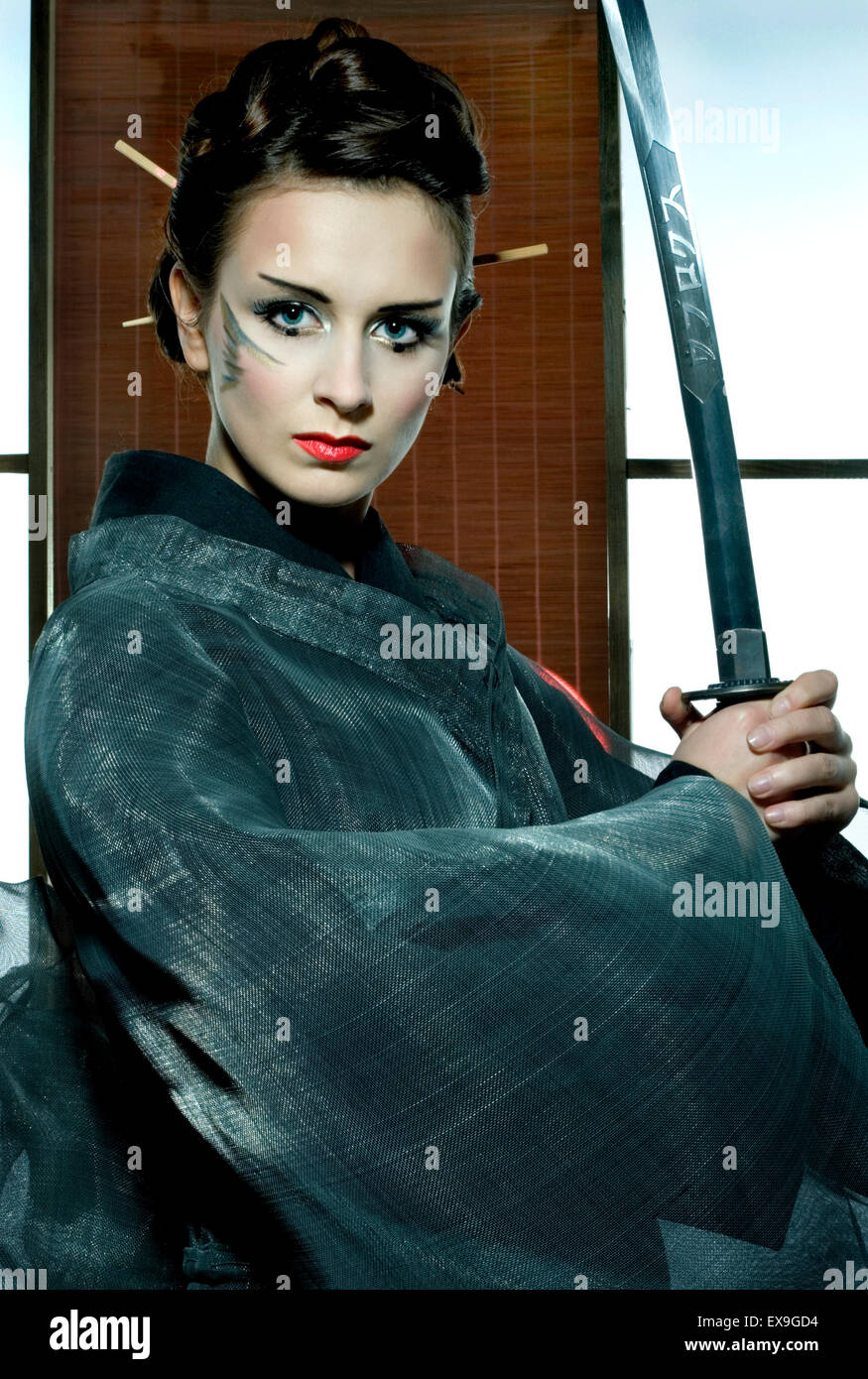 beautiful japanese grey kimono woman with samurai sword in traditional ...
