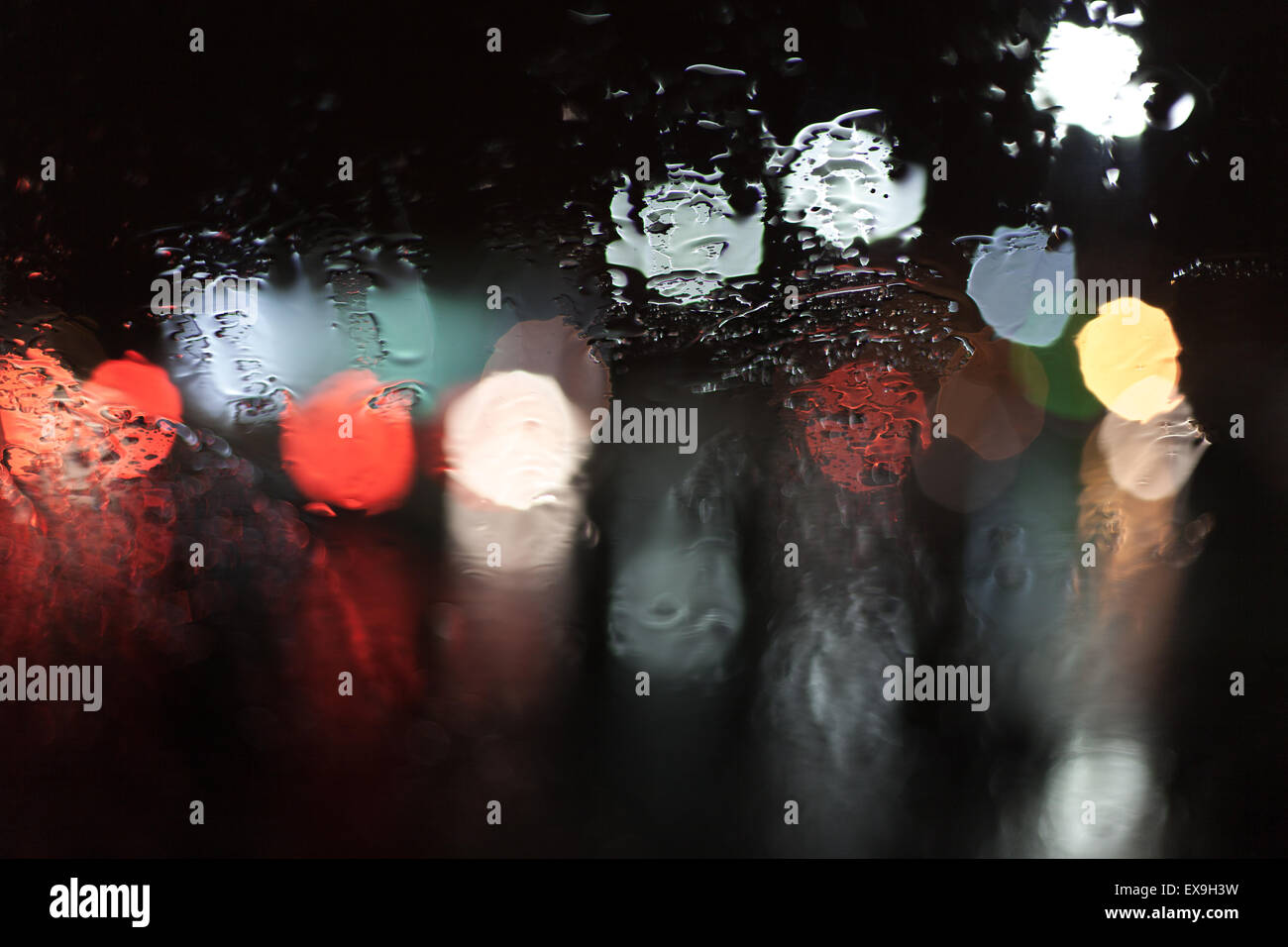 blurry lights through a rainy window, creating a bokeh effect Stock ...