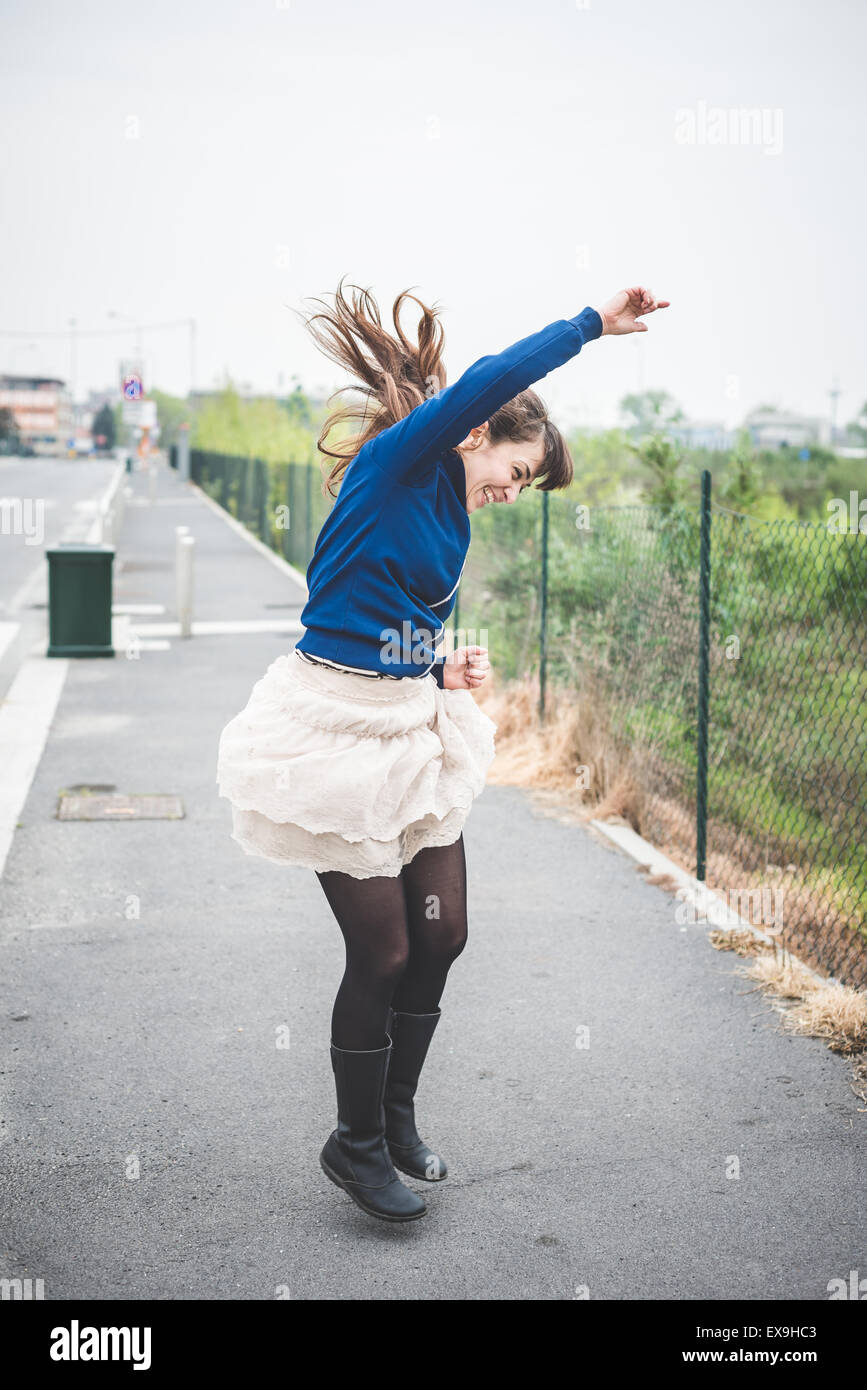 Stylish woman dancing having fun hi-res stock photography and images ...