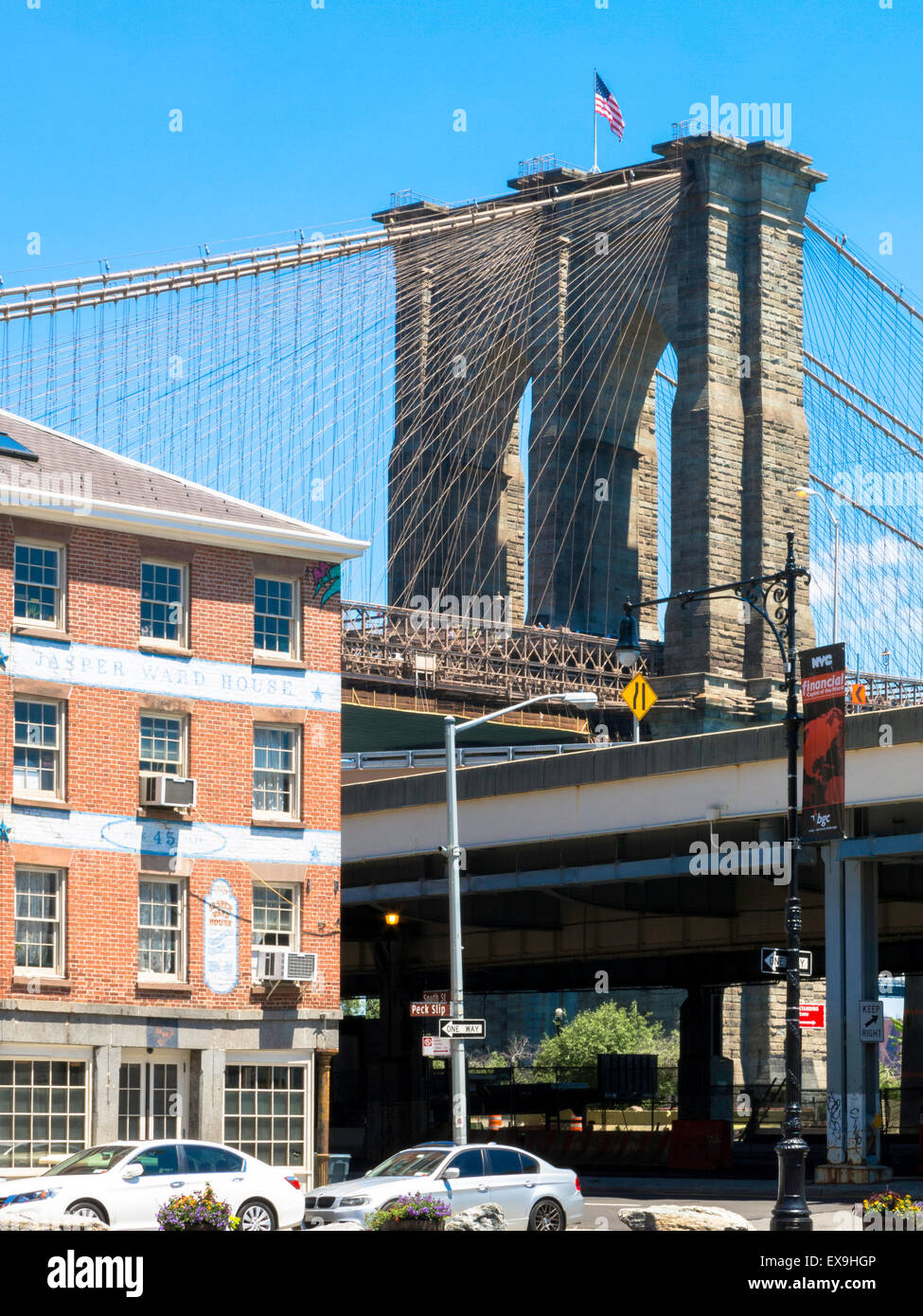 South Street Seaport Historic District with the Brooklyn Bridge in ...