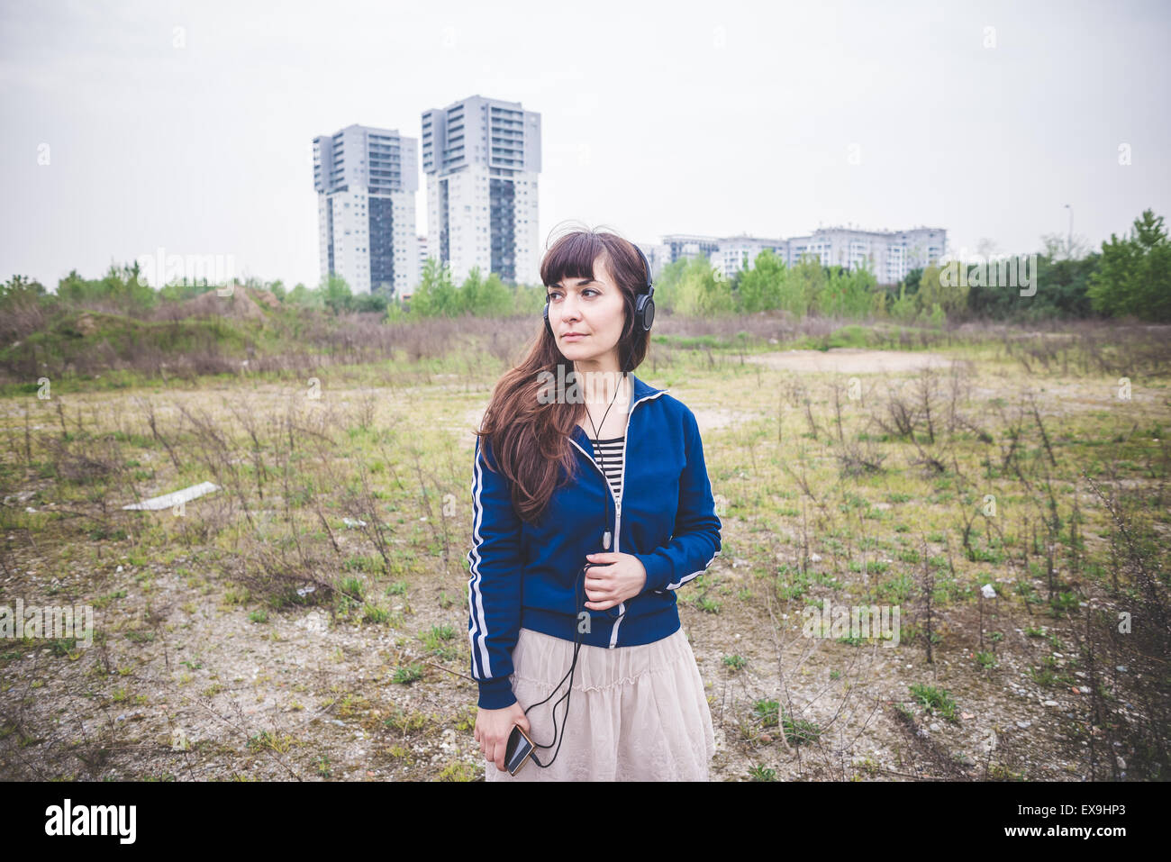 beautiful woman in a desolate lurban landscape Stock Photo - Alamy