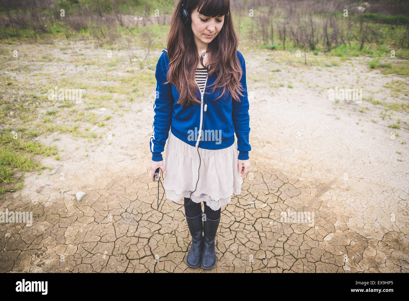 beautiful woman in a desolate lurban landscape Stock Photo - Alamy