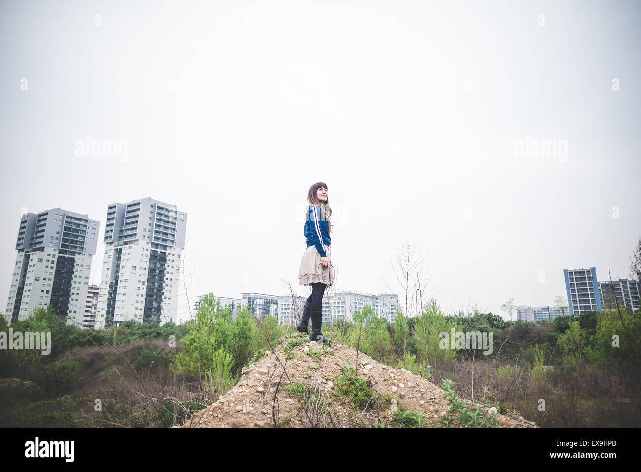 beautiful woman in a desolate lurban landscape Stock Photo - Alamy
