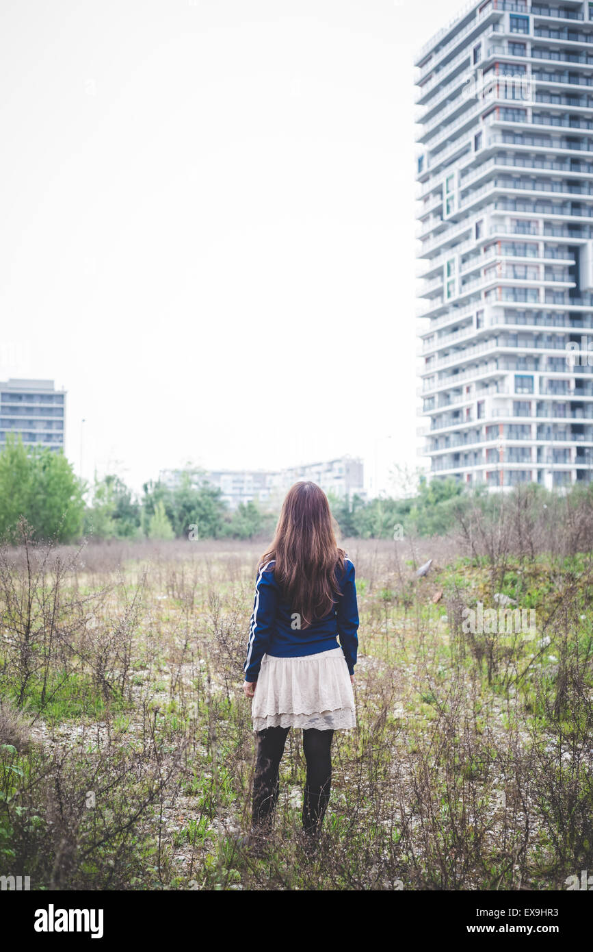 beautiful woman in a desolate lurban landscape Stock Photo - Alamy