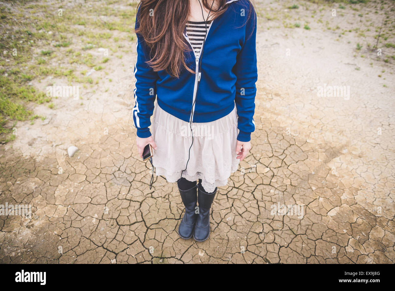 beautiful woman in a desolate lurban landscape Stock Photo - Alamy