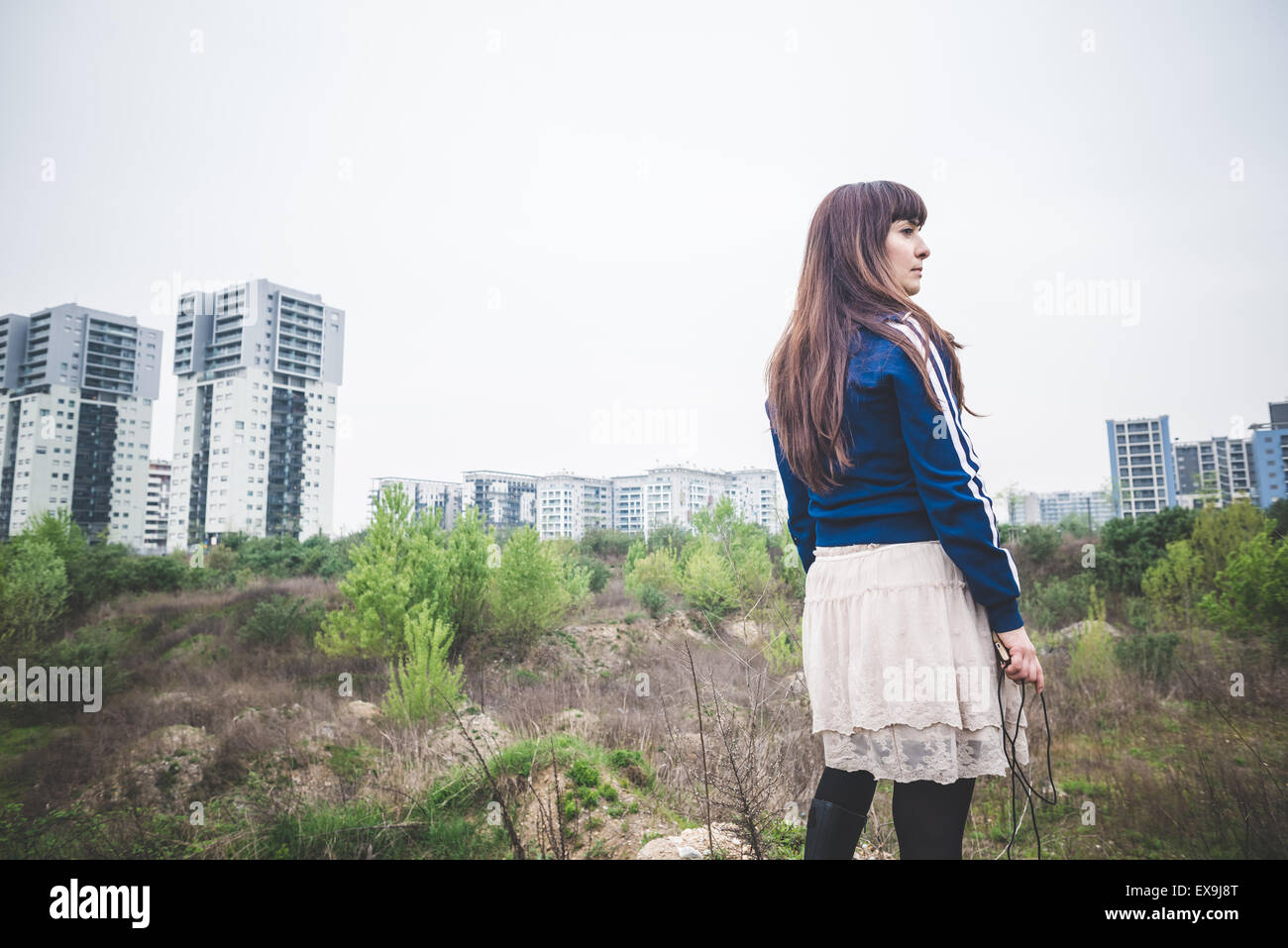 beautiful woman in a desolate lurban landscape Stock Photo - Alamy