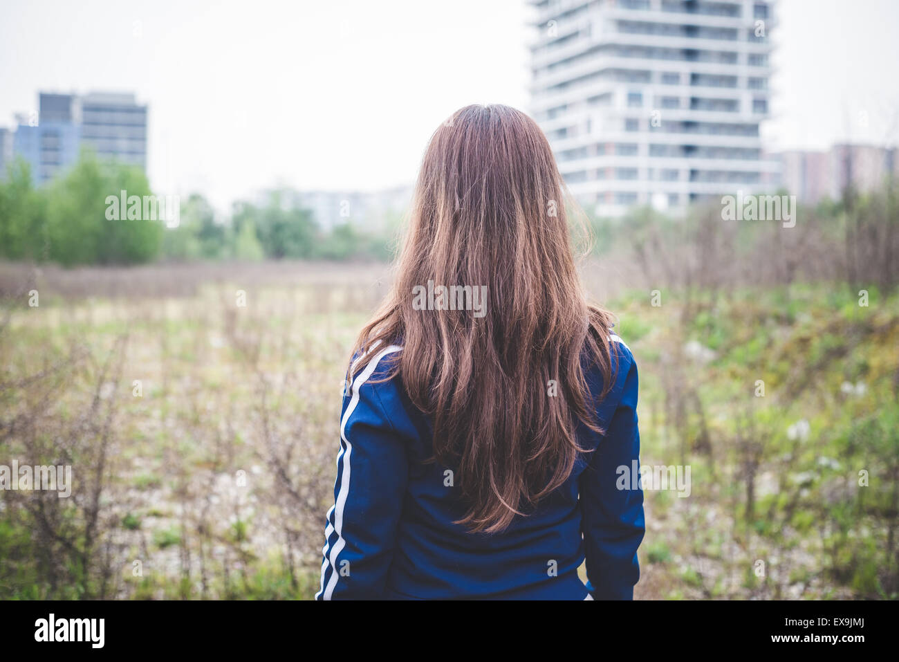 beautiful woman in a desolate lurban landscape Stock Photo - Alamy