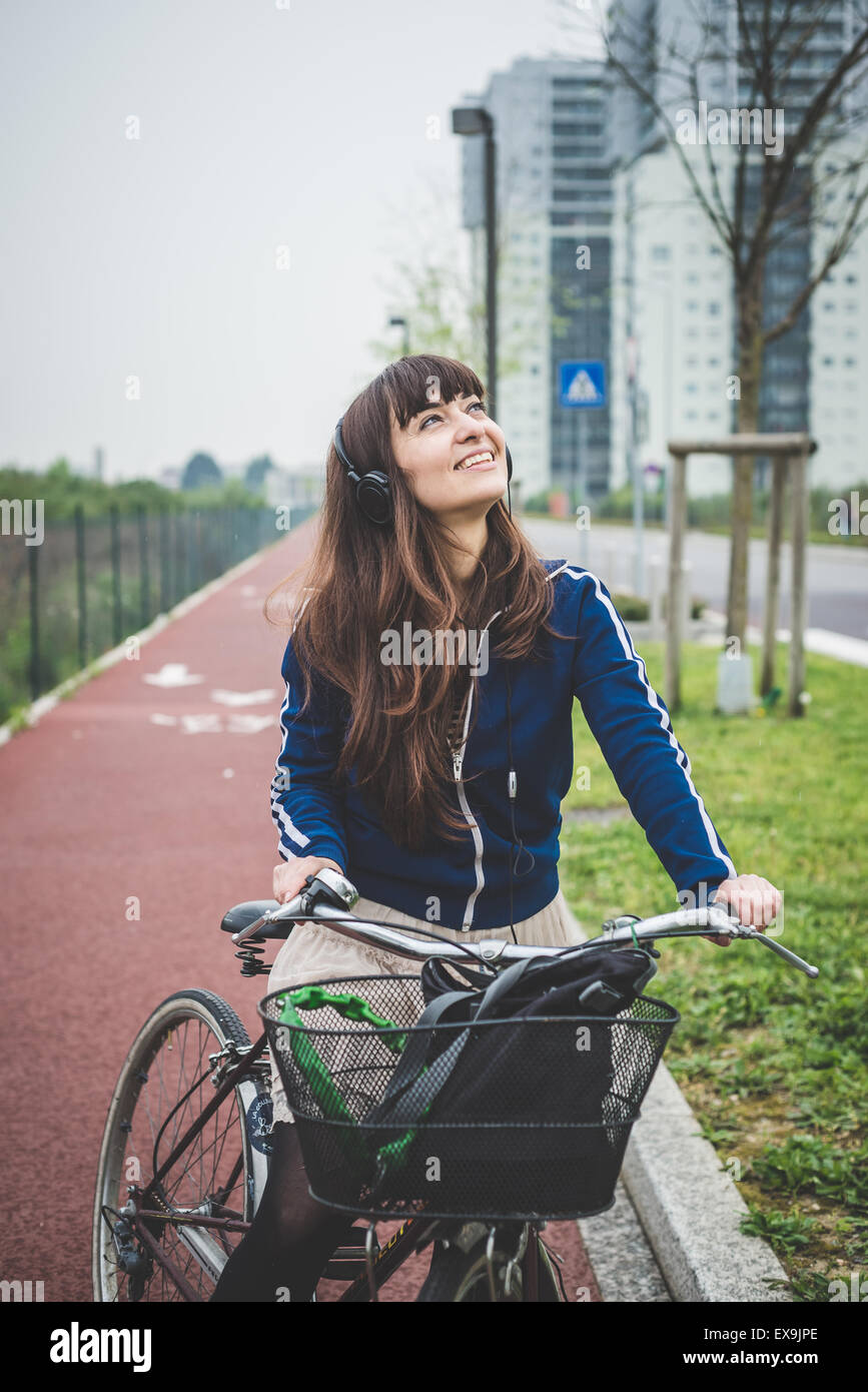 beautiful woman biker cycling in a desolate lurban landscape Stock ...