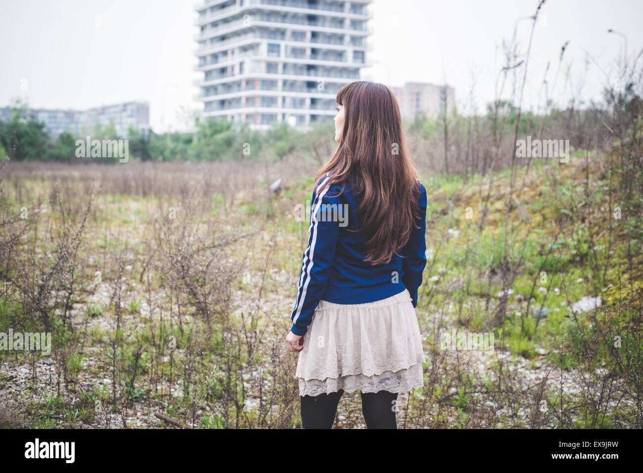 beautiful woman in a desolate lurban landscape Stock Photo - Alamy
