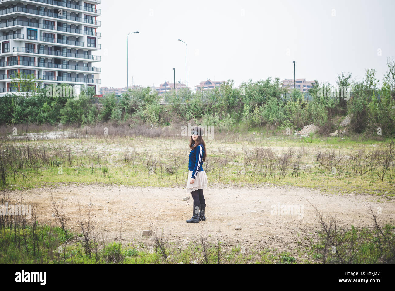 beautiful woman in a desolate lurban landscape Stock Photo - Alamy