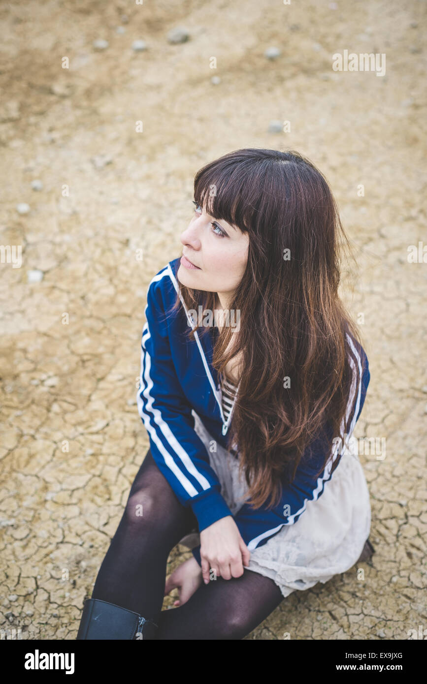 beautiful woman in a desolate lurban landscape Stock Photo - Alamy