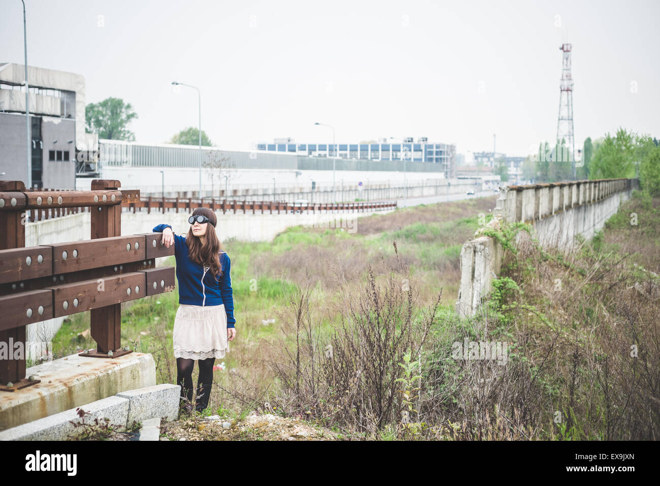 beautiful woman in a desolate lurban landscape Stock Photo - Alamy