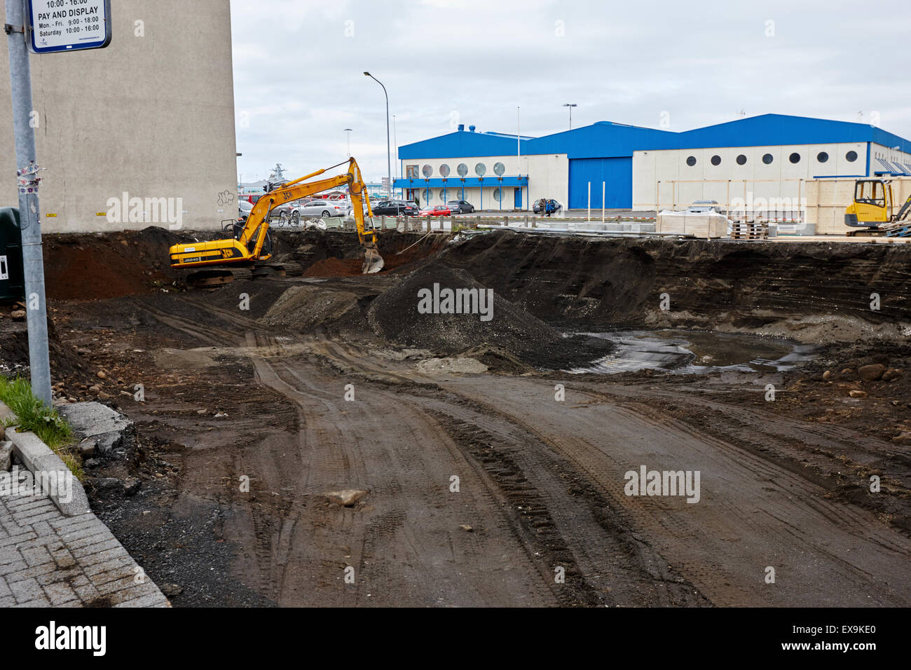 new building groundwork excavation through layers of volcanic material ...