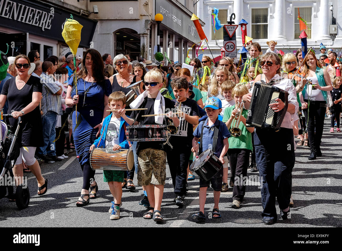 Children and adults participate in colourful parades on Mazey Day, part ...