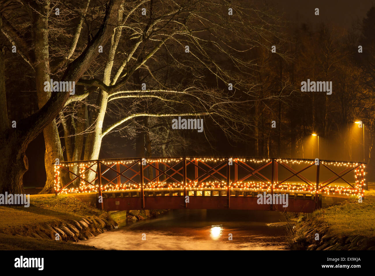 Christmas lights on a bridge at night Stock Photo - Alamy