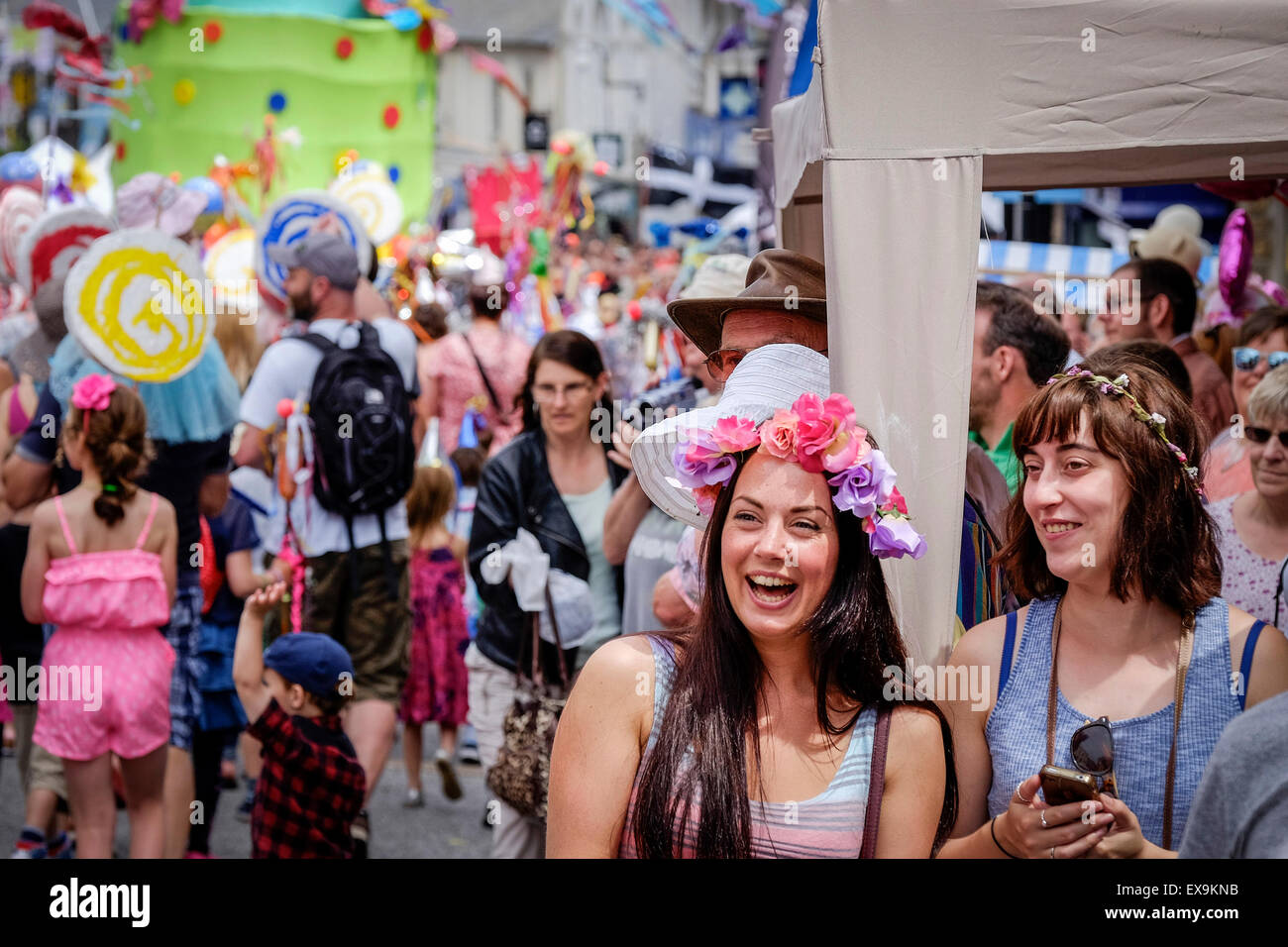 Spectators enjoying the colourful parades on Mazey Day, part of the ...