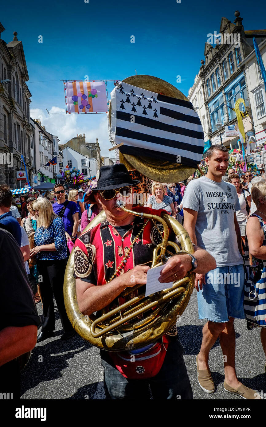 A sousaphone player participating in one of the colourful parades on ...