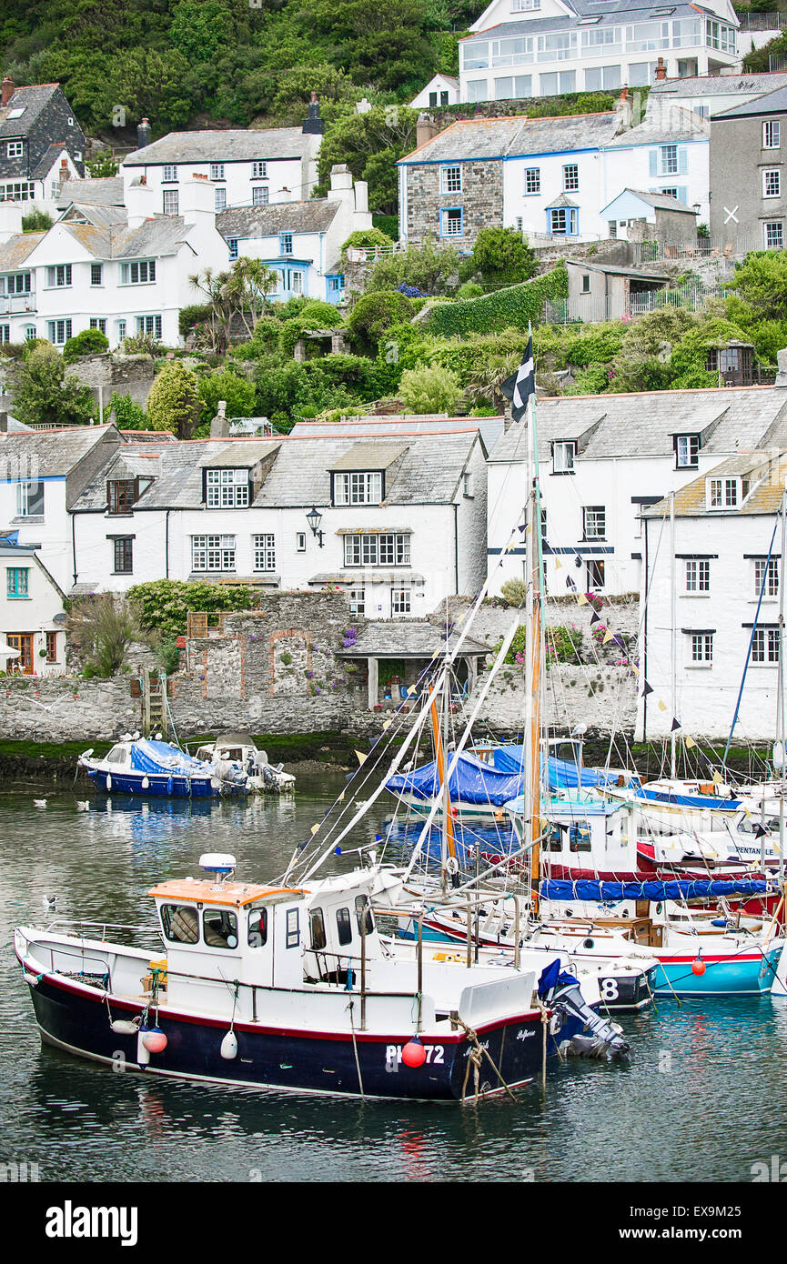 Fishing boats moored in the harbour in the picturesque Cornish fishing ...
