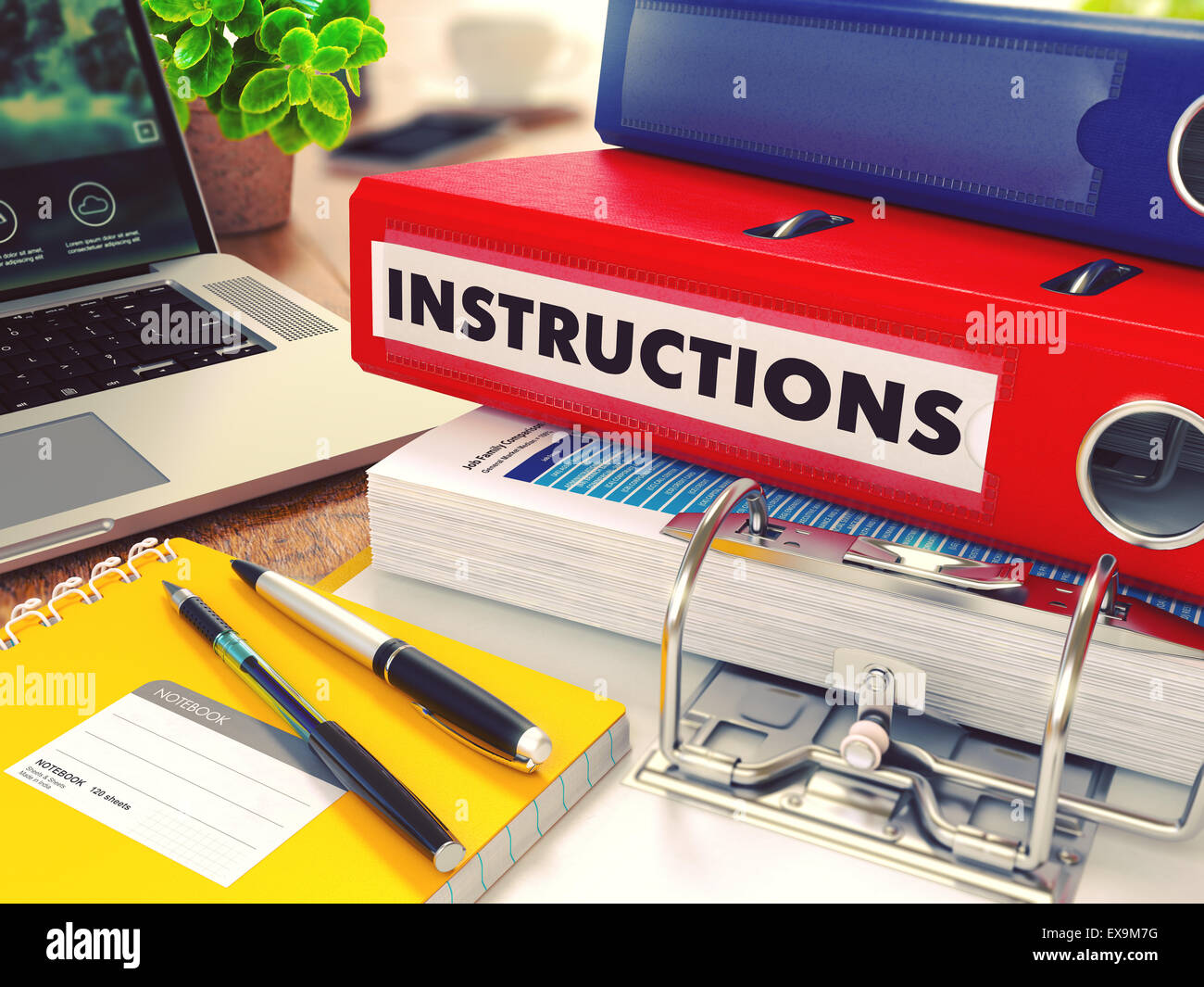 Instructions on Red Office Folder. Toned Image Stock Photo - Alamy