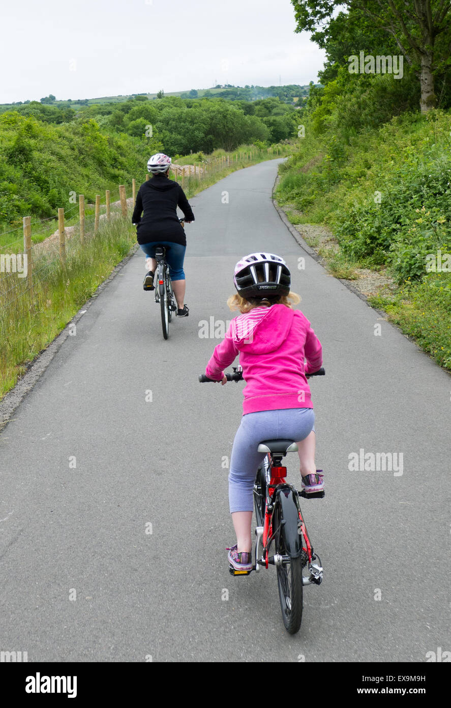 Mother and daughter on bicycles hi-res stock photography and images - Alamy