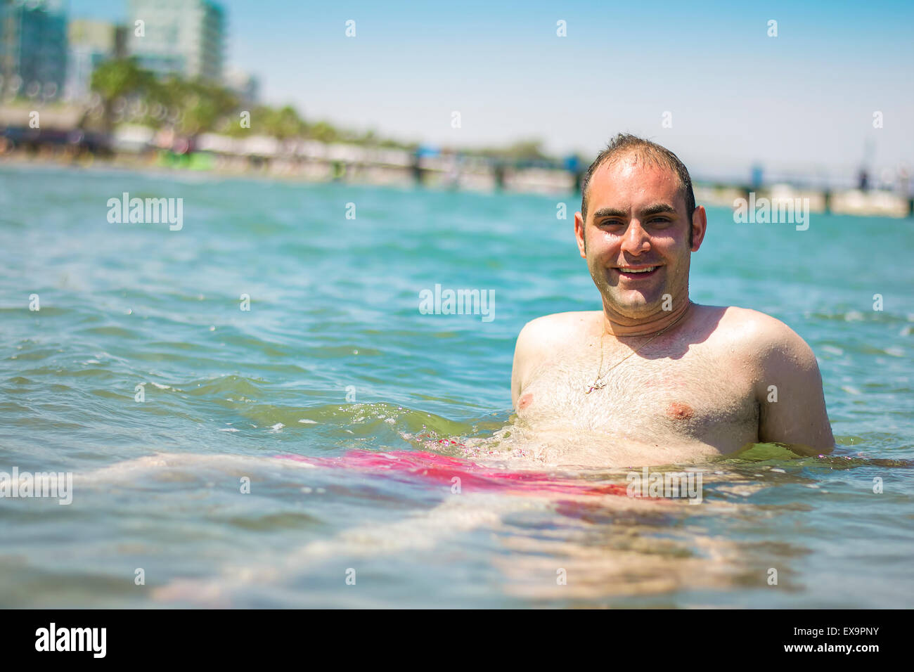 Man enjoying his holiday in the mediterranean sea Stock Photo - Alamy