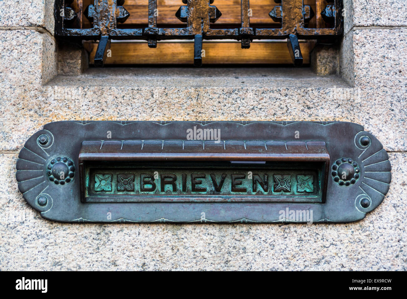 Brass or bronze mail slot in canal house in Amsterdam Stock Photo - Alamy