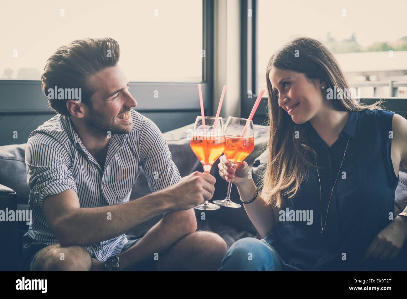 young beautiful couple lovers at the cafe Stock Photo - Alamy