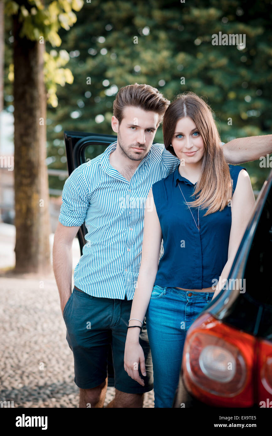 young beautiful couple lovers in the car Stock Photo - Alamy
