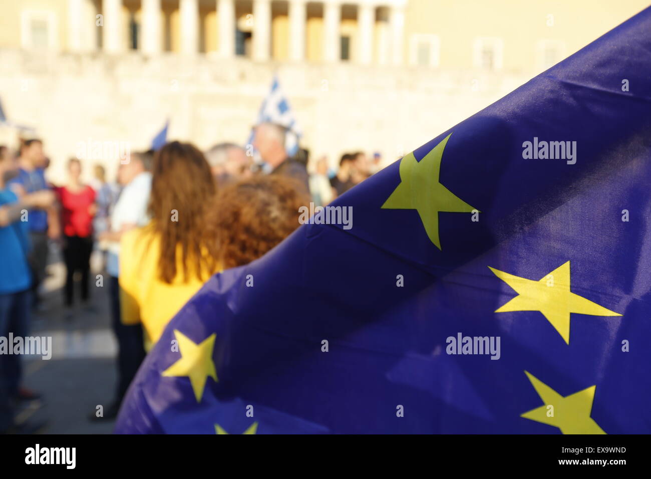 Athens, Greece. 9th July 2015. A protester carries a European flag at ...