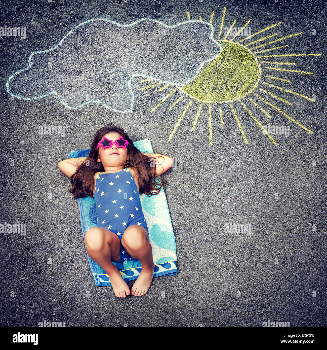 Little girl sunbathing lying on hi-res stock photography and images - Alamy