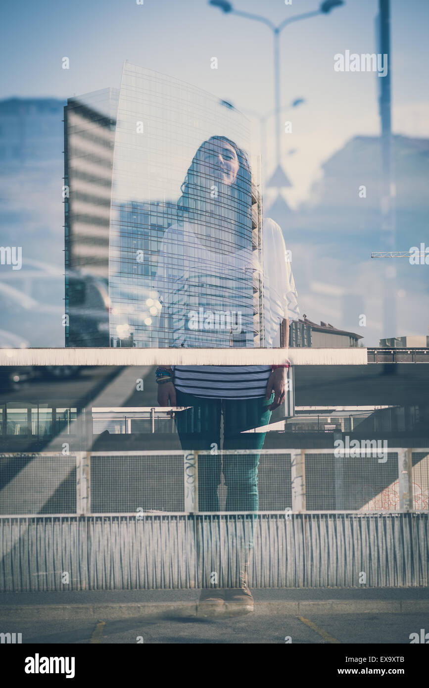 overlap young beautiful brunette woman in the city Stock Photo - Alamy