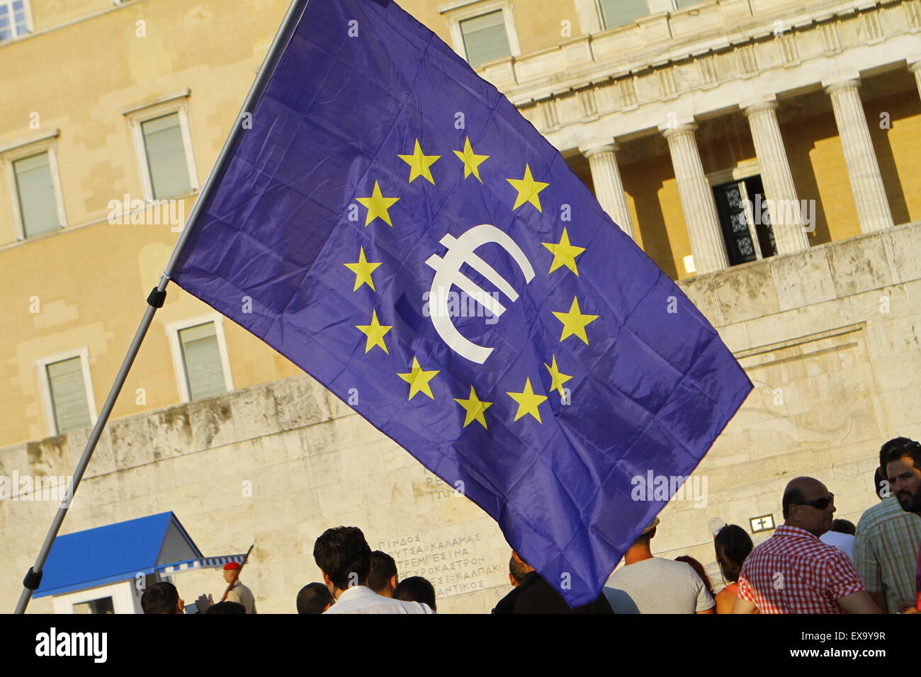 Athens, Greece. 09th July, 2015. A protester waves a large European ...