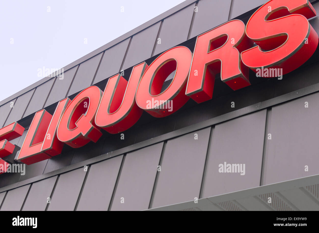 Red Retro Liquor Sign Outside Alcohol Store Stock Photo - Alamy