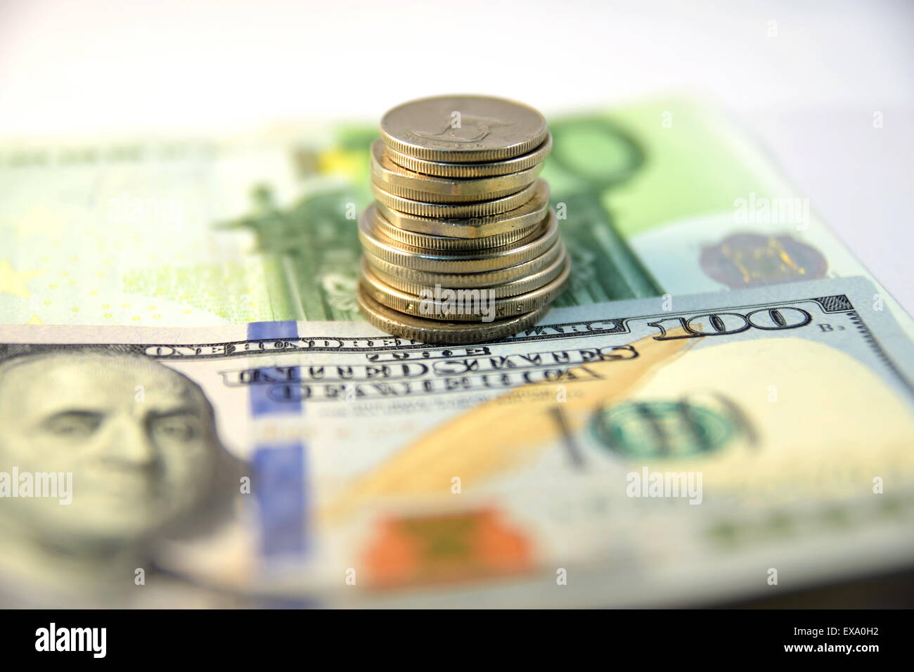 Close up of Various currency notes and coins from different countries ...